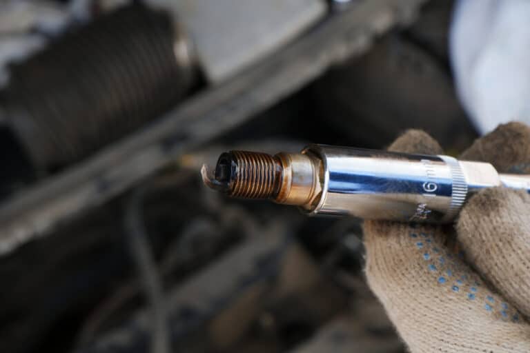 Oil On Spark Plugs: Causes, Solutions & Prevention